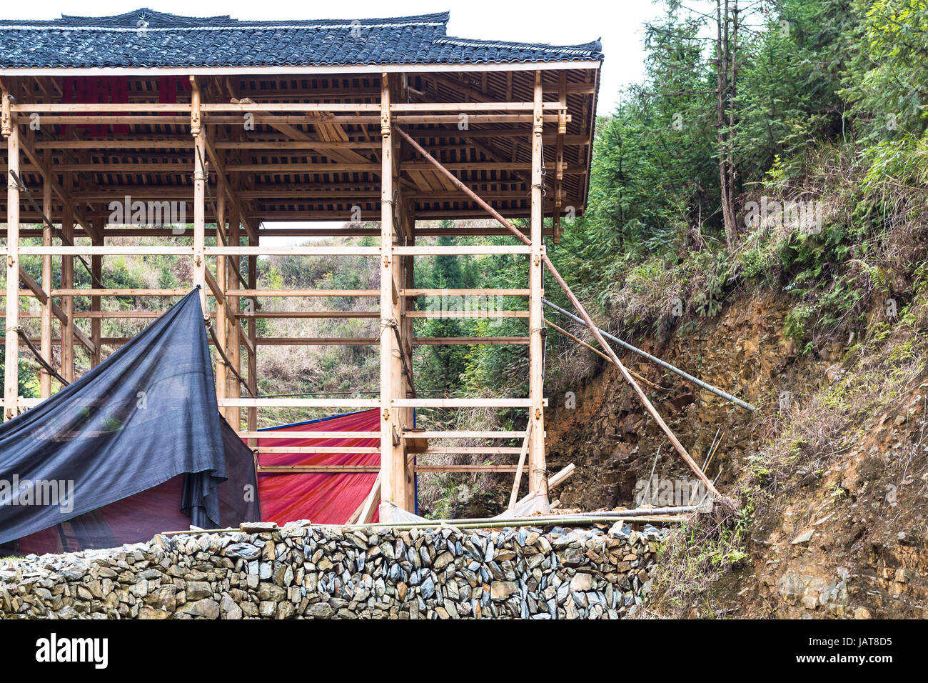 travel to China - building of new log house in Dazhai village in area ...