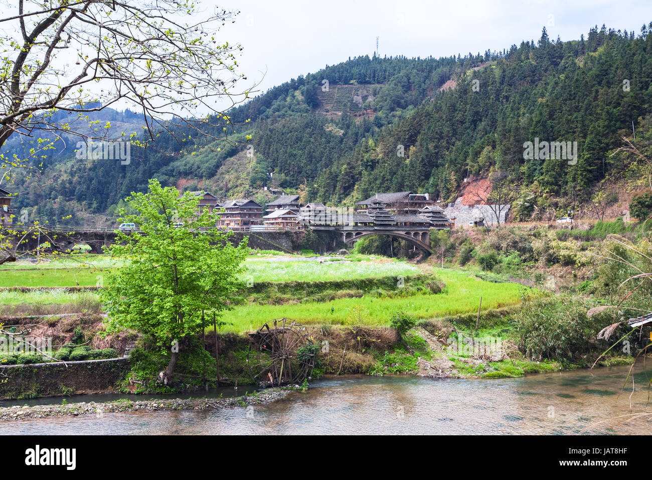 travel to China - view of Chengyang village with Bridge from gardens in ...