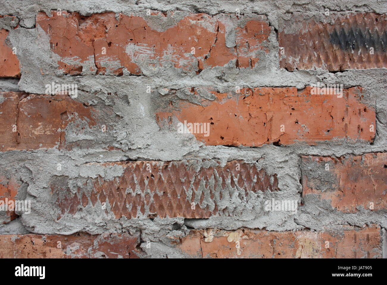 Brick wall. Building mistake. Cement to perform. Photo for your design ...