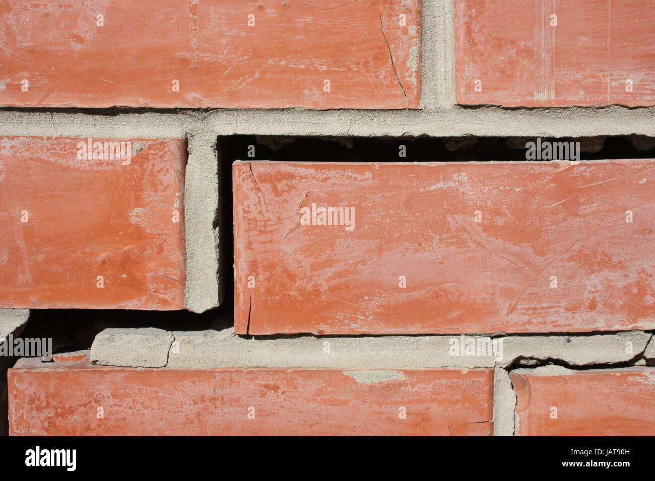 Destruction. Brick wall. Crack Photo for your design Stock Photo - Alamy