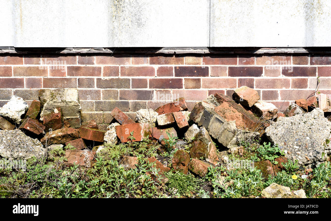 Old brick background with weeds hi-res stock photography and images - Alamy