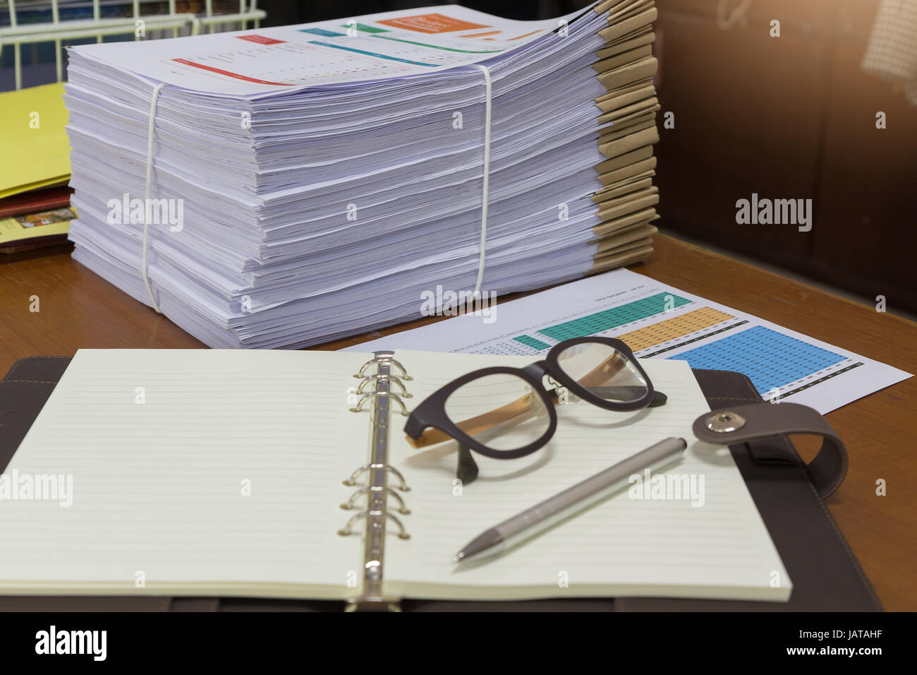 Pile of unfinished documents on office desk, Stack of business paper ...