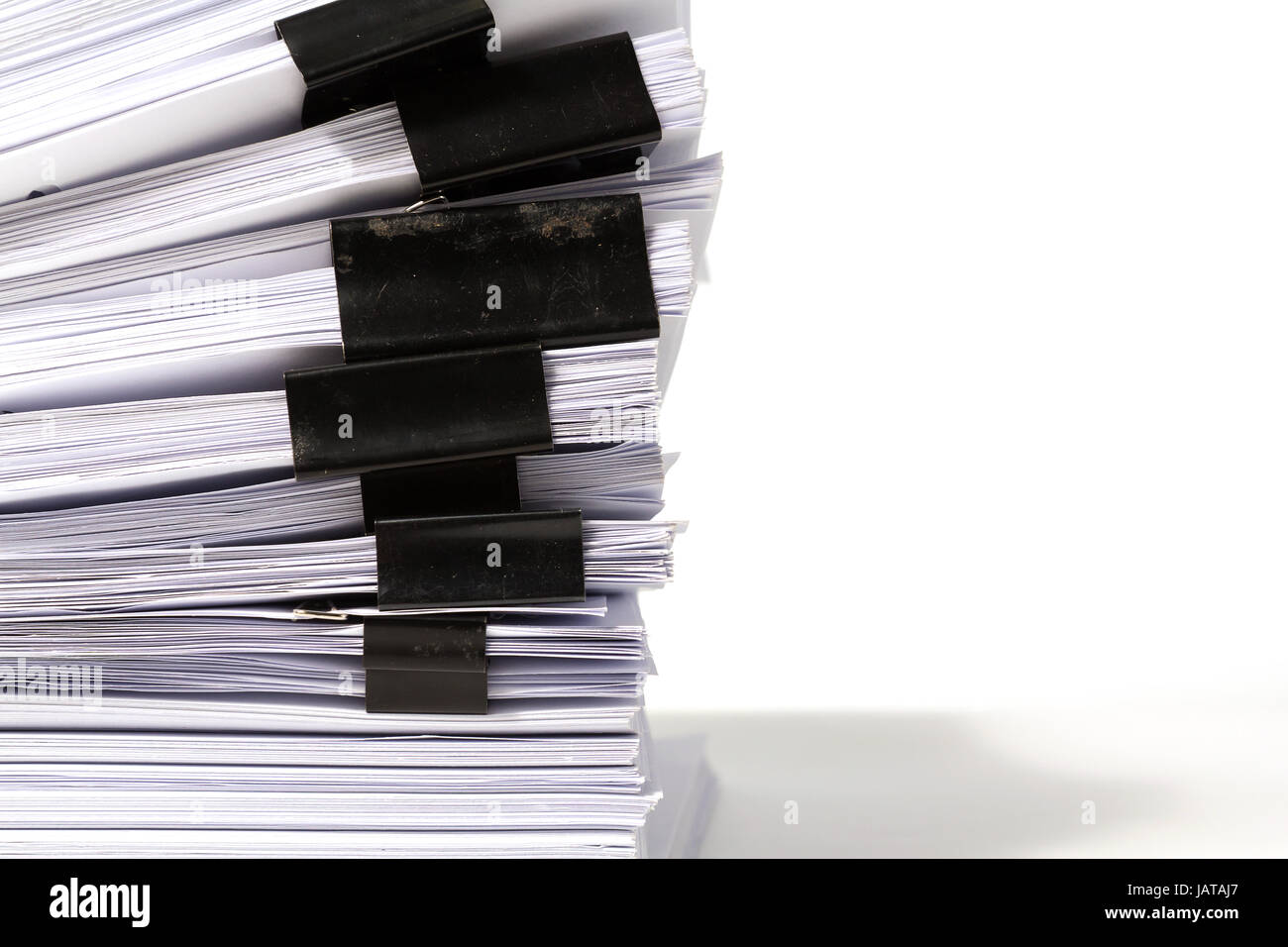 Stack of business papers isolated on white background Stock Photo - Alamy