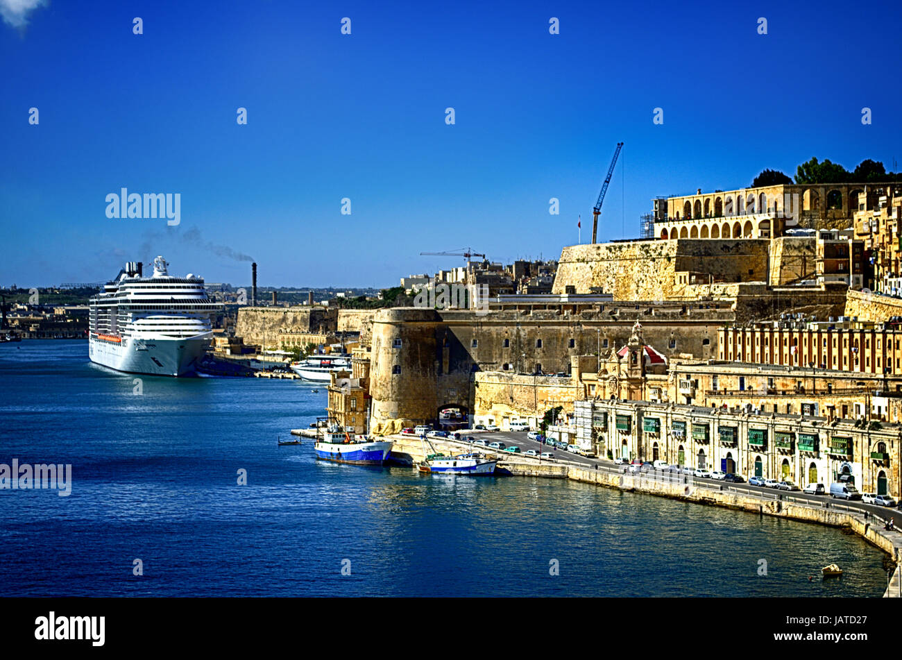 Skyline of the Maltese capital city Valletta in warm, late afternoon ...