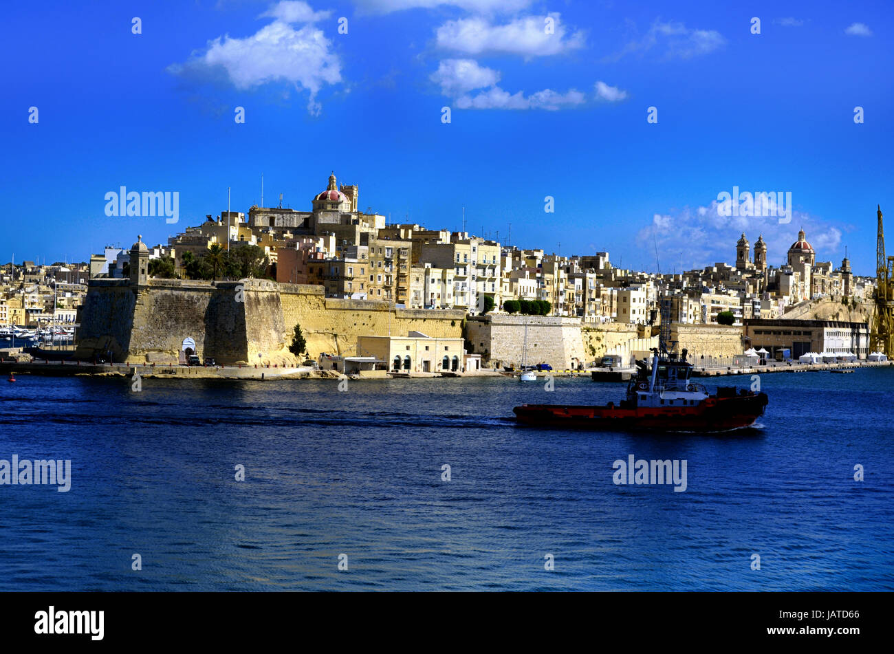 Skyline of the Maltese capital city Valletta in warm, late afternoon ...