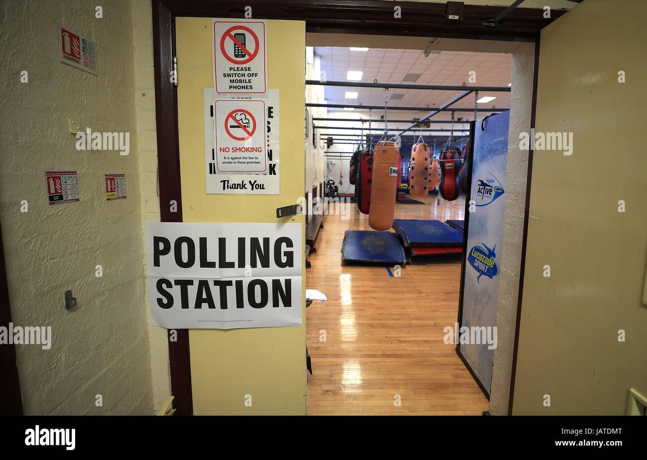 People cast their vote in the General Election at a polling station in ...