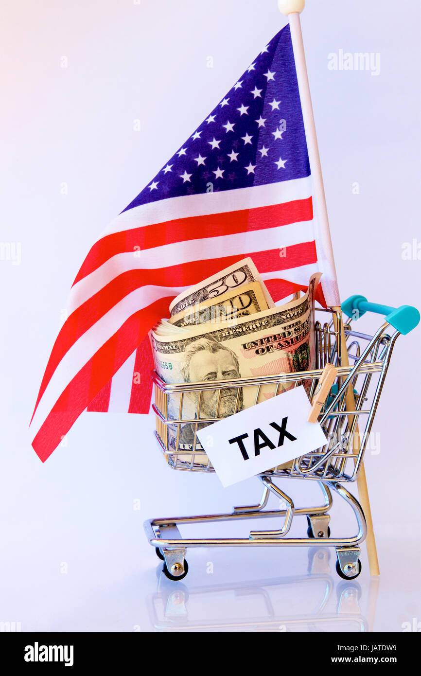 American dollars and flag in a trolley with a US flag Stock Photo - Alamy