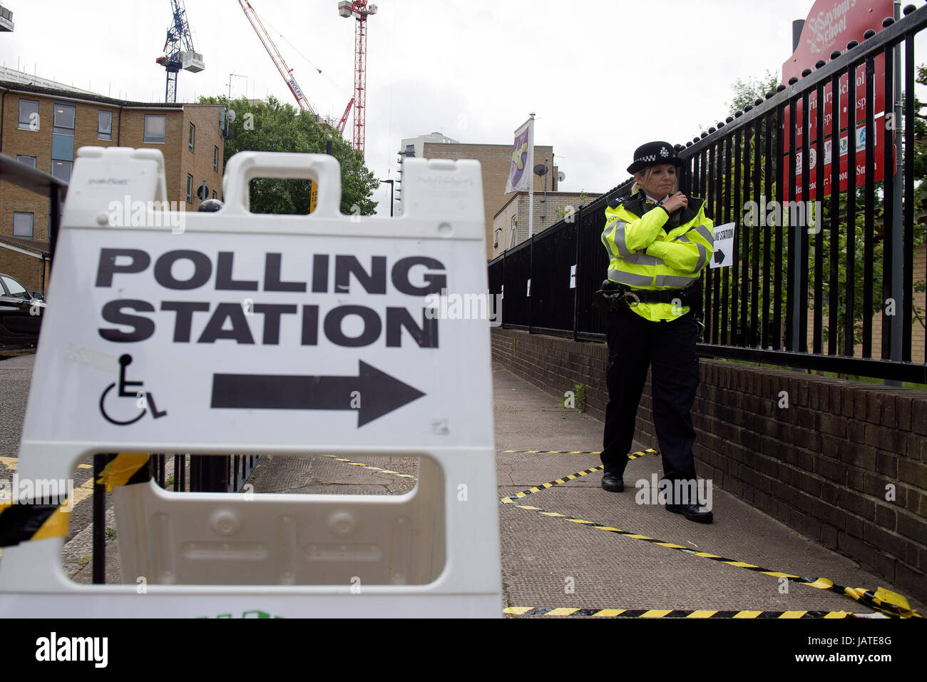 As people cast their votes in the general election hi-res stock ...