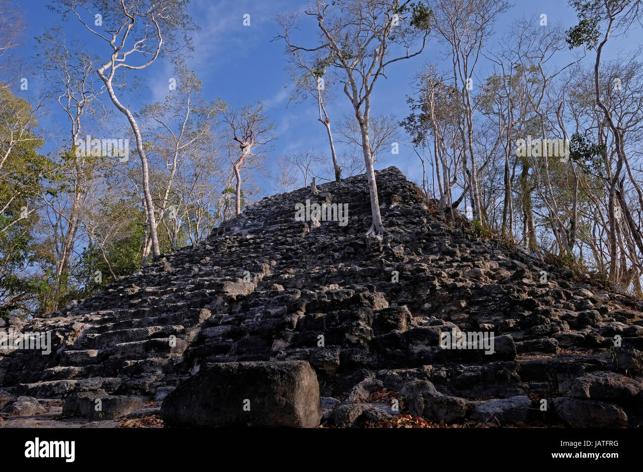 View of a small pyramid structure on the side of the main pyramid on ...