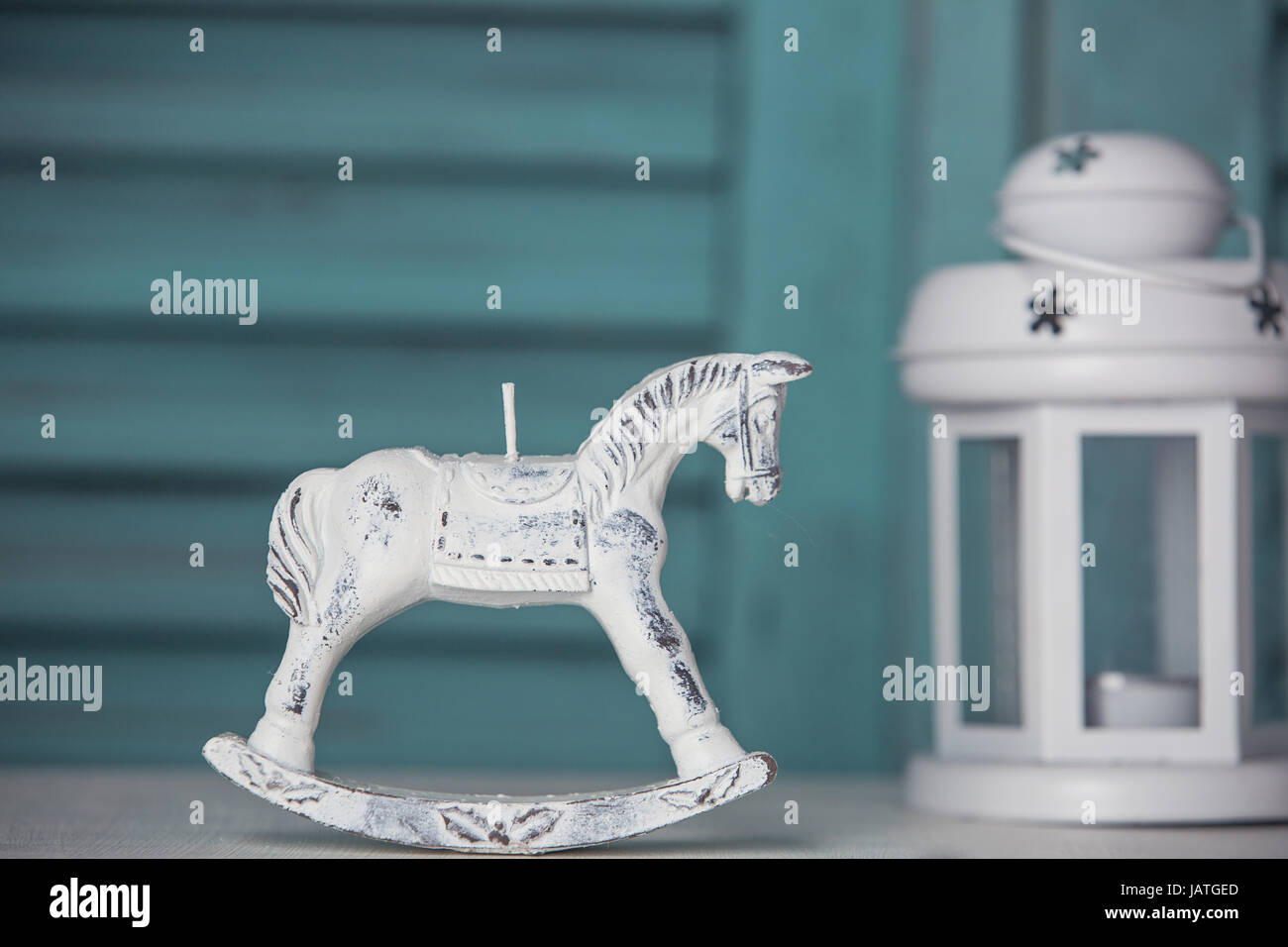 Rocking horse with lantern Stock Photo - Alamy