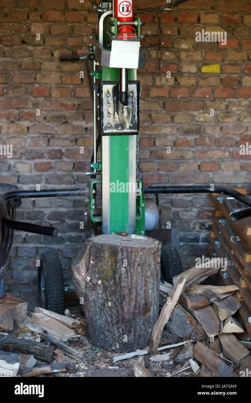 The front view of a stationary hydraulic wood splitter Stock Photo - Alamy