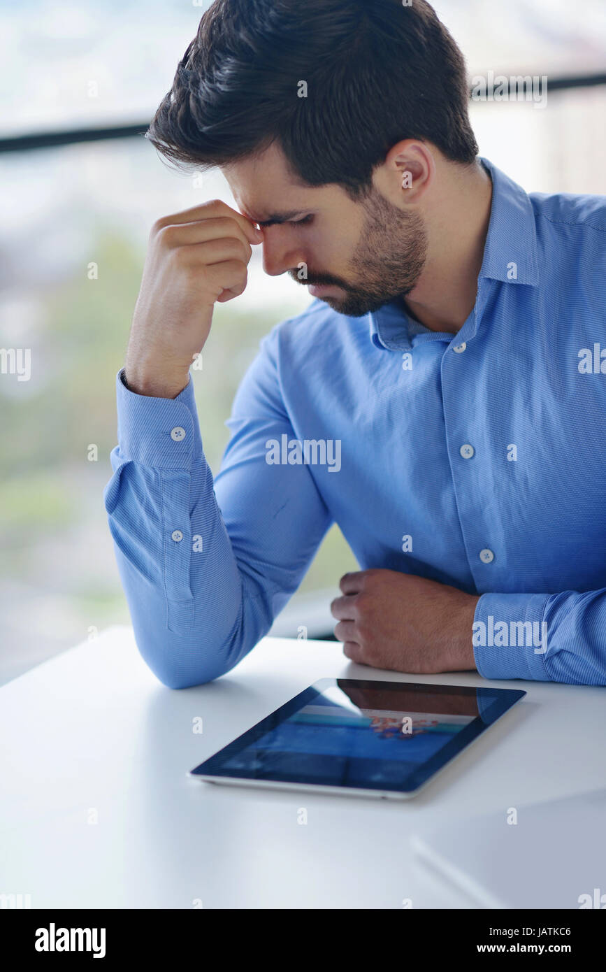 happy young business man work in modern office on computer Stock Photo ...