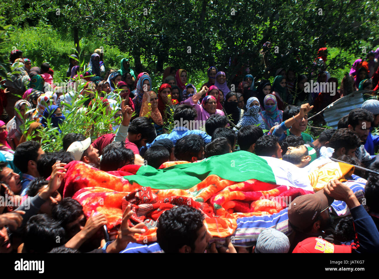 Shopian, India. 07th June, 2017. Kashmiri villagers carry the body of ...
