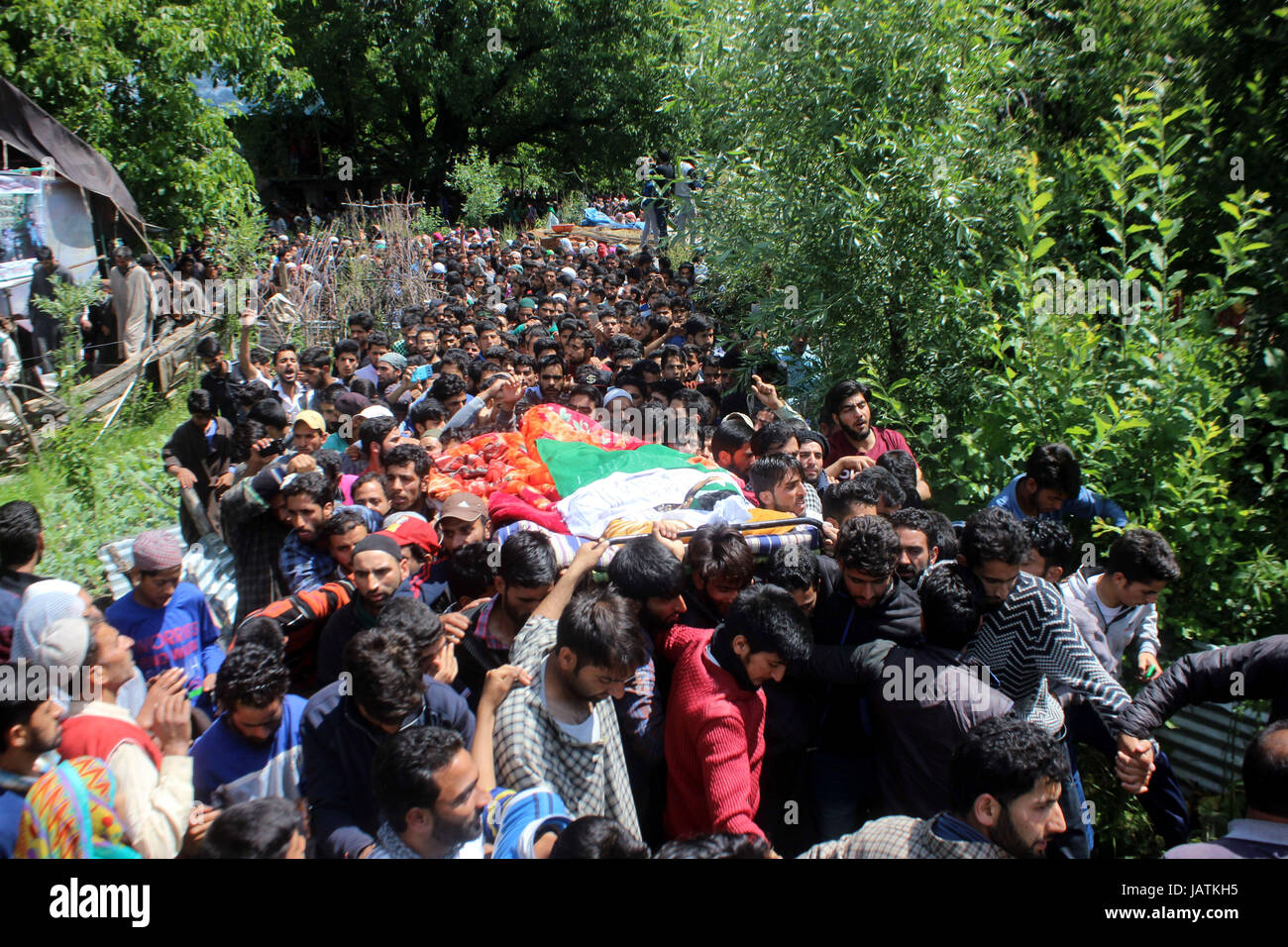 Shopian, India. 07th June, 2017. Kashmiri villagers carry the body of ...