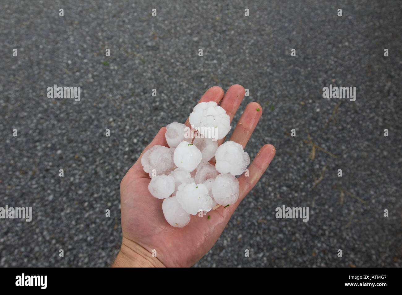 Hand large ball hail hi-res stock photography and images - Alamy