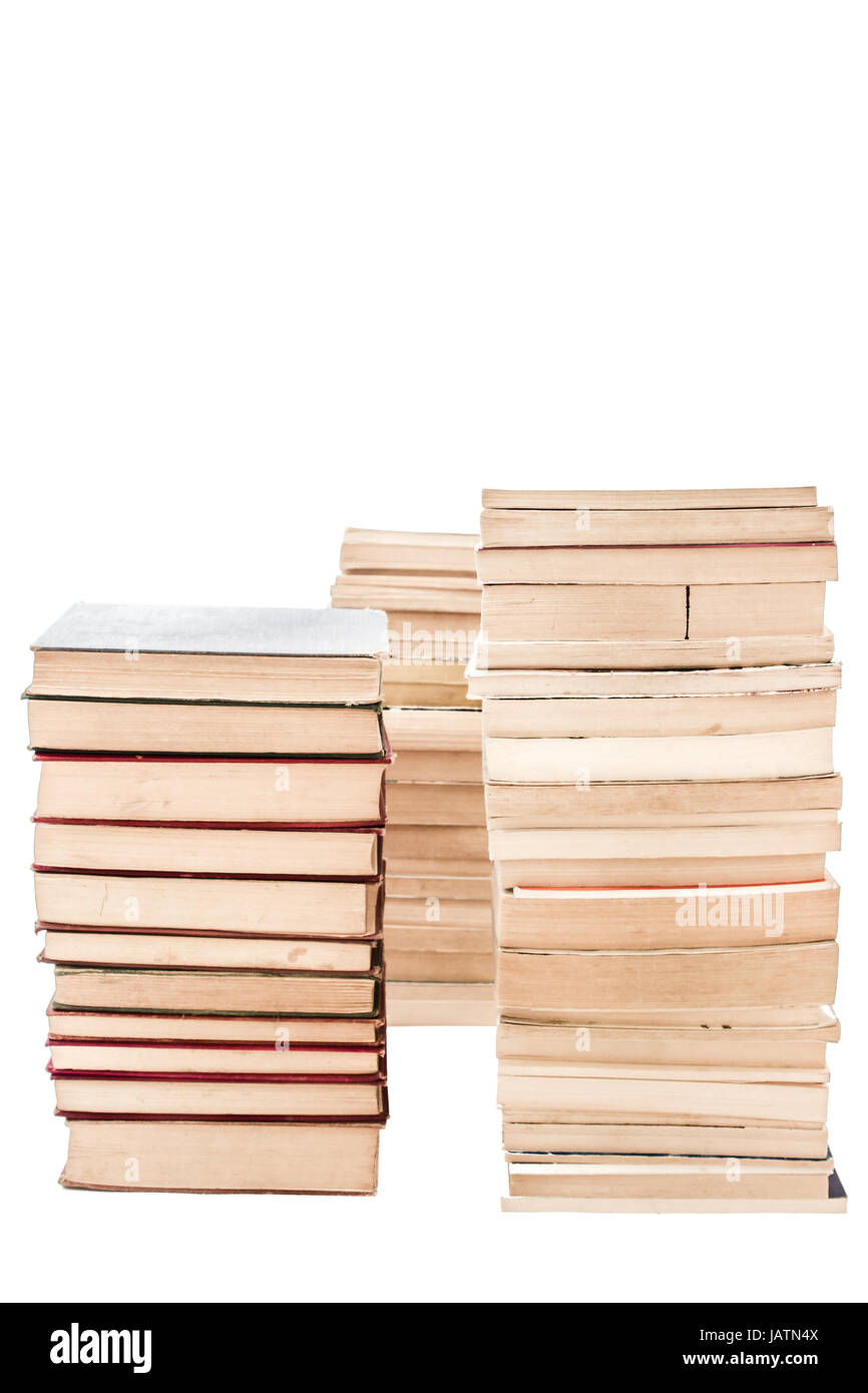 Piles of weathered old books with copyspace on white background Stock ...