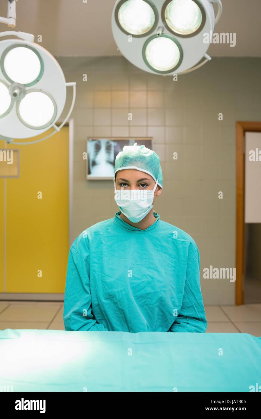 Nurse sitting behind operating table hi-res stock photography and ...