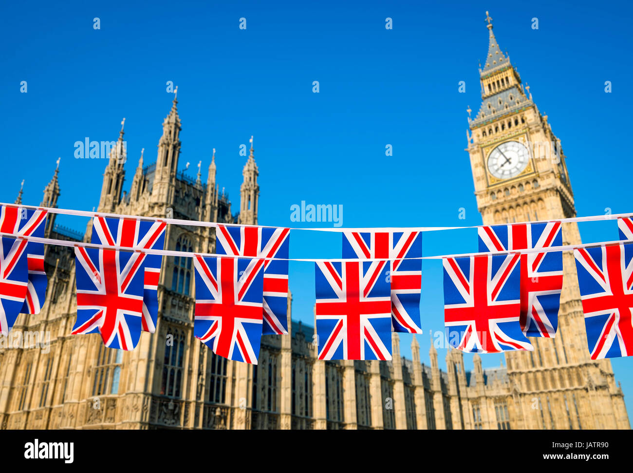 Two rows of Union Jack bunting flying in front of the Houses of ...