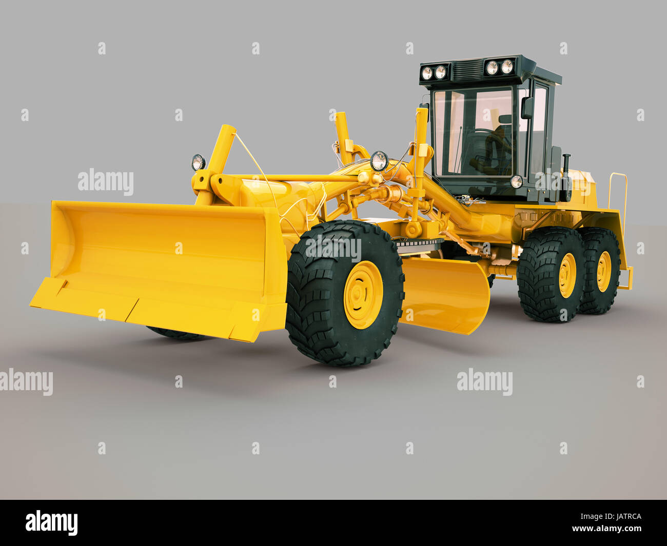 Modern three-axle road grader on a gray background Stock Photo - Alamy