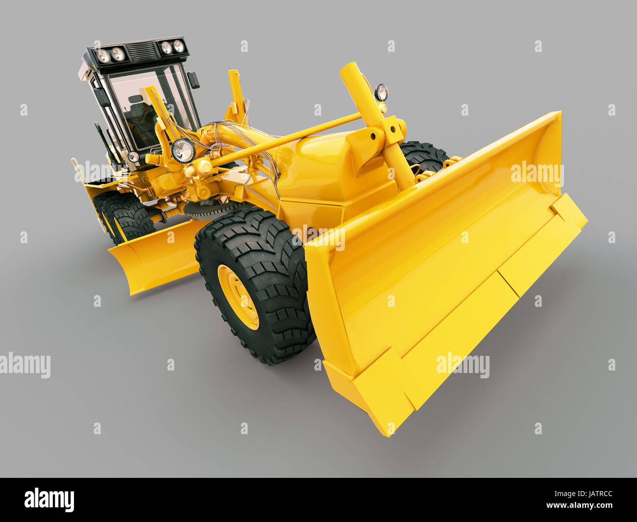 Modern three-axle road grader on a gray background Stock Photo - Alamy