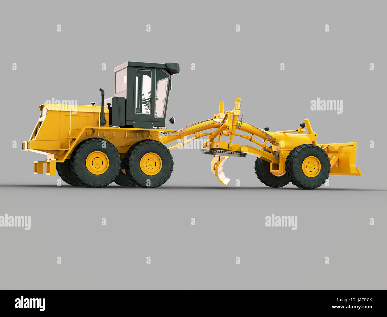 Modern three-axle road grader on a gray background Stock Photo - Alamy