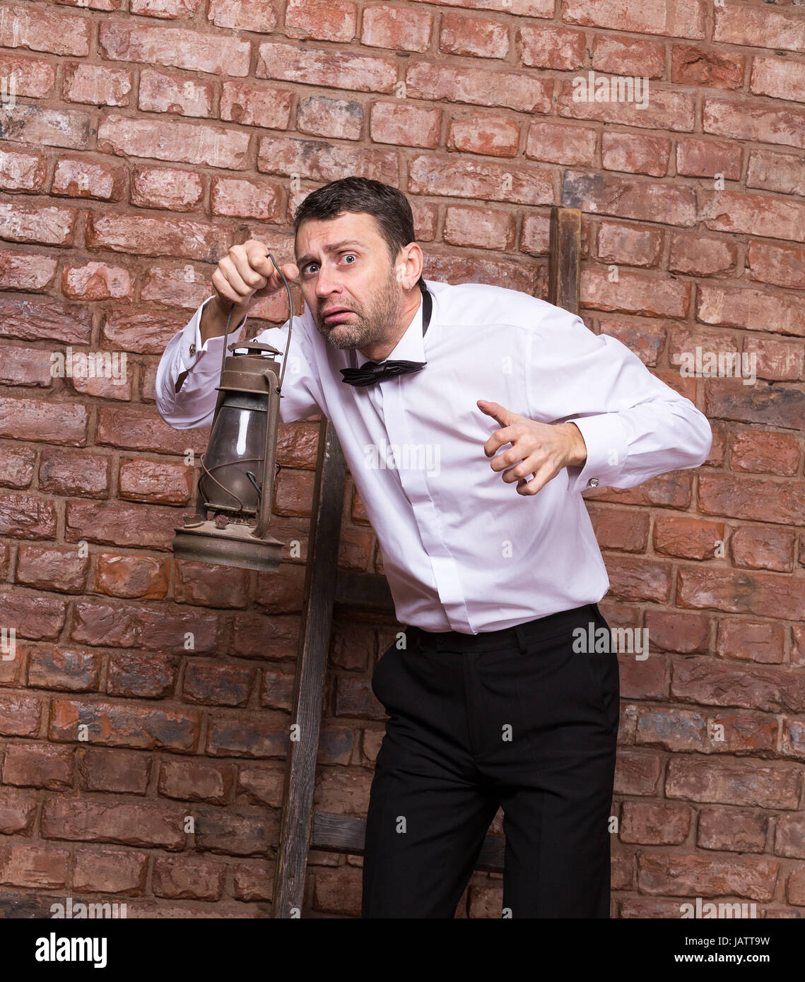 Man against wall scared hi-res stock photography and images - Alamy