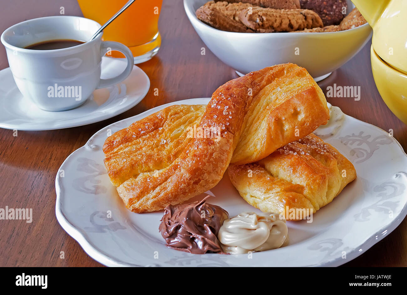 breakfast set with snack, fruit juice, cookies, coffee and tea Stock ...