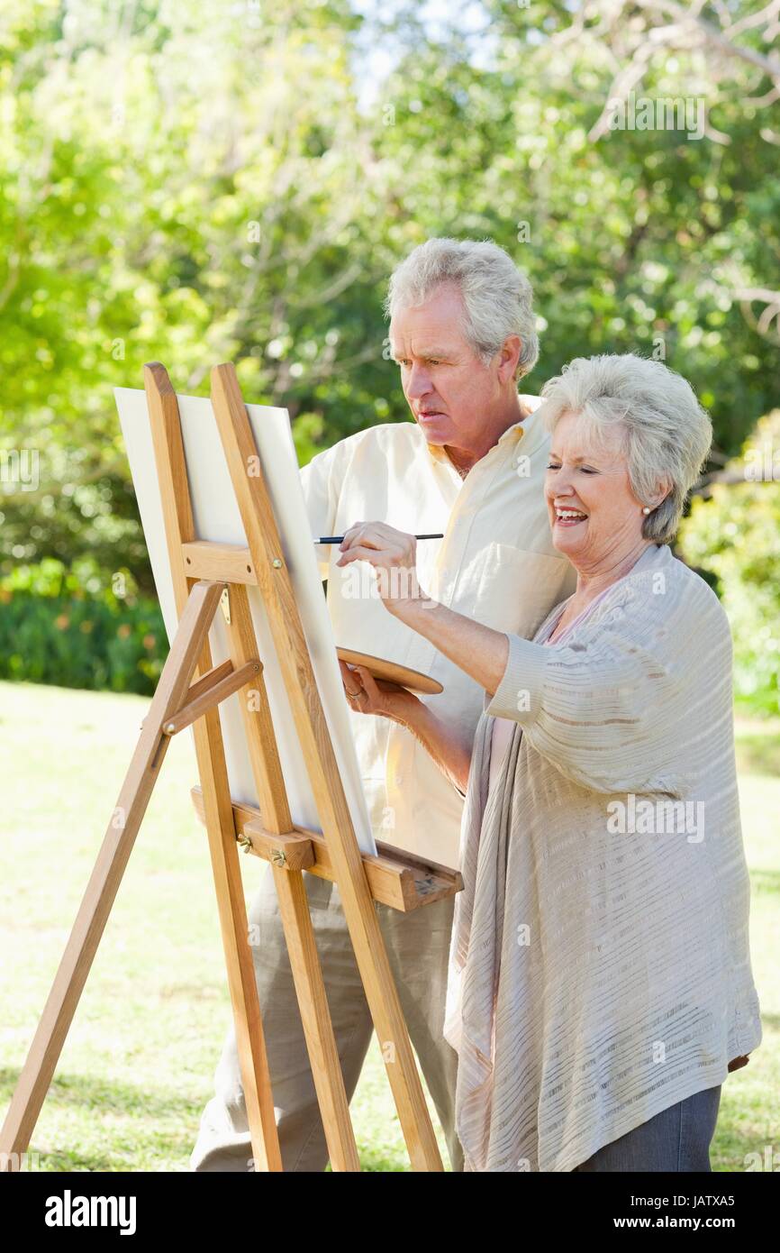 Two friends painting Stock Photo - Alamy