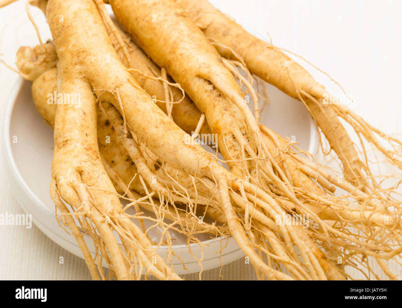 Fresh ginseng root texture Stock Photo - Alamy