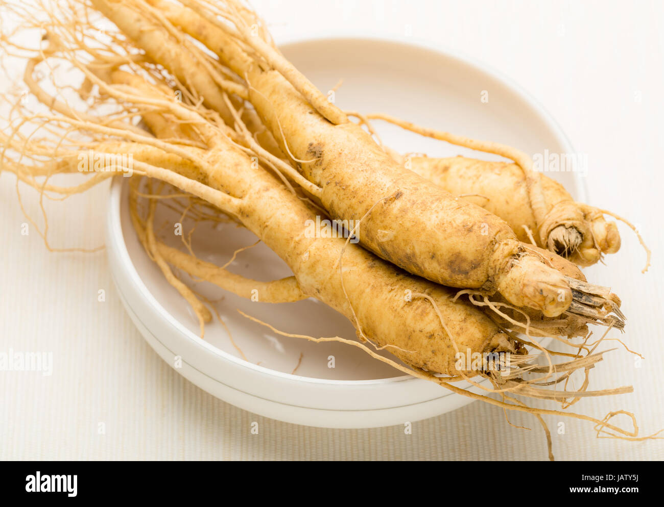 Fresh ginseng root texture Stock Photo - Alamy