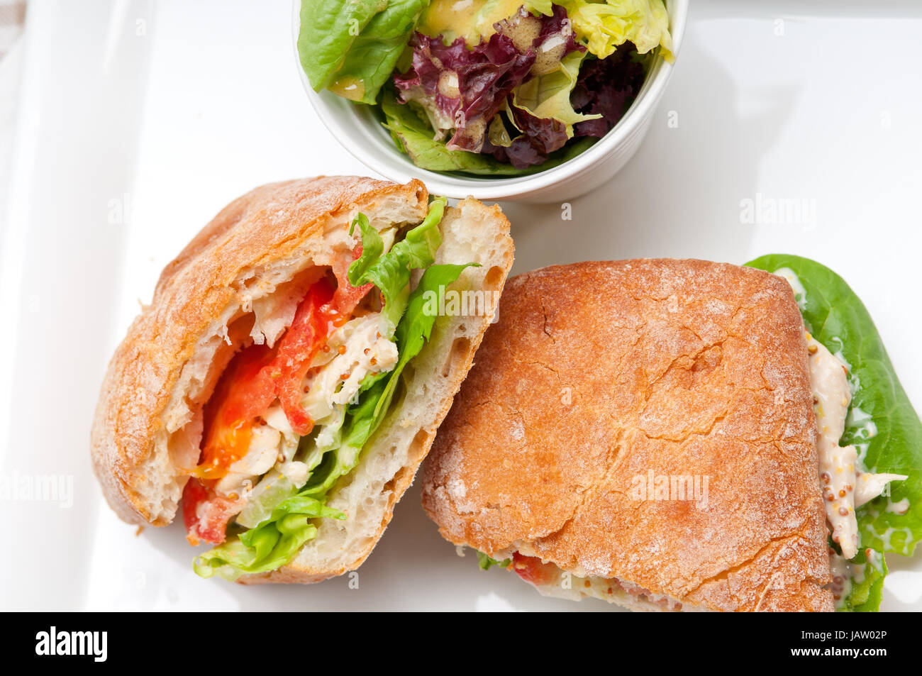 italian ciabatta panini sandwich with chicken and tomato Stock Photo ...