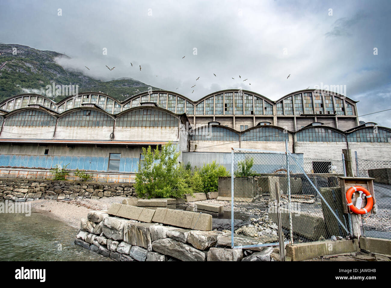abandoned warehouse on waterfront norway Stock Photo - Alamy