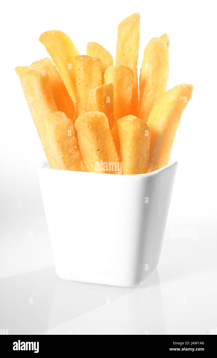 White ceramic container of crispy French fries or deep fried potato ...
