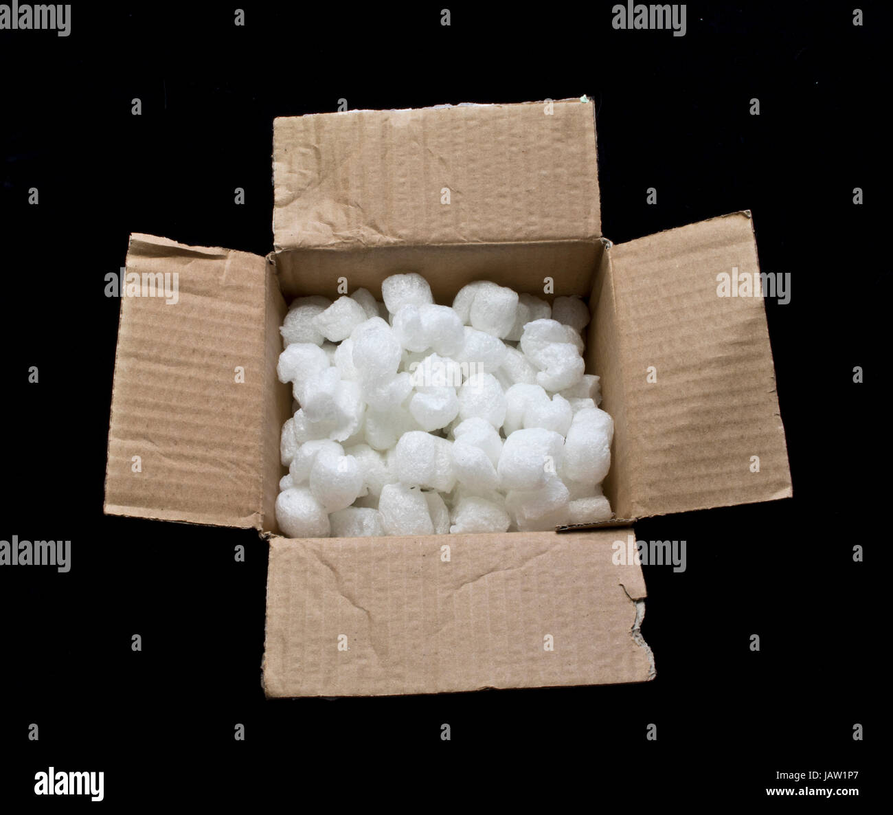 White Packing Peanut Foam in Cardboard Box Stock Photo - Alamy