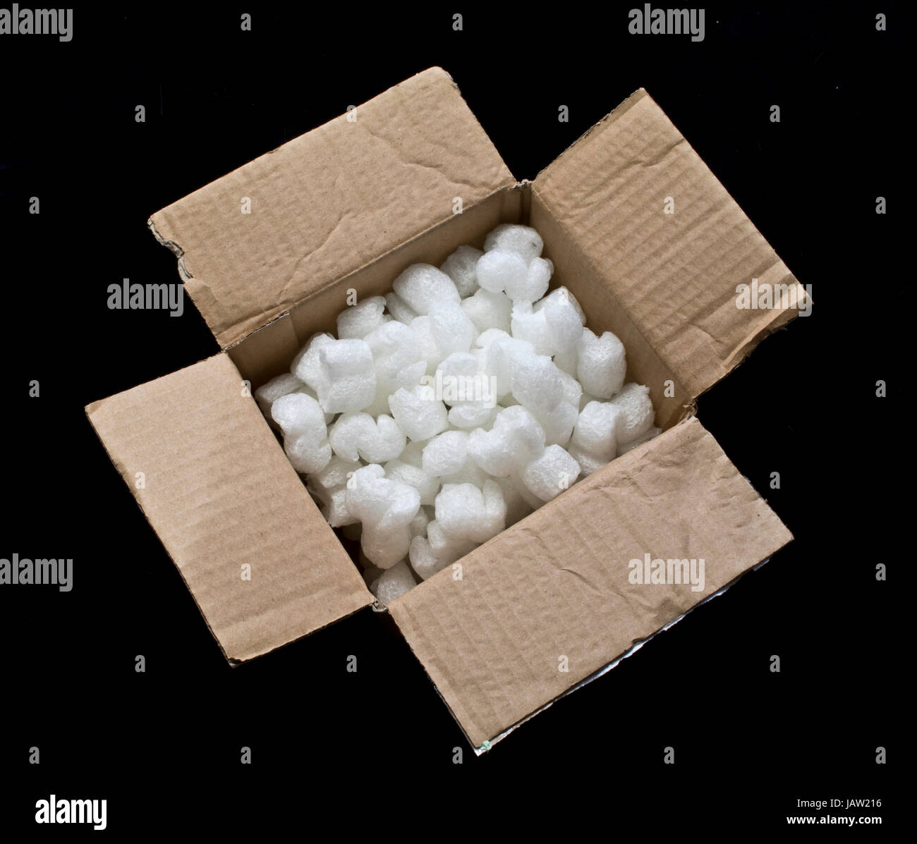 White Packing Peanut Foam in Cardboard Box Stock Photo - Alamy