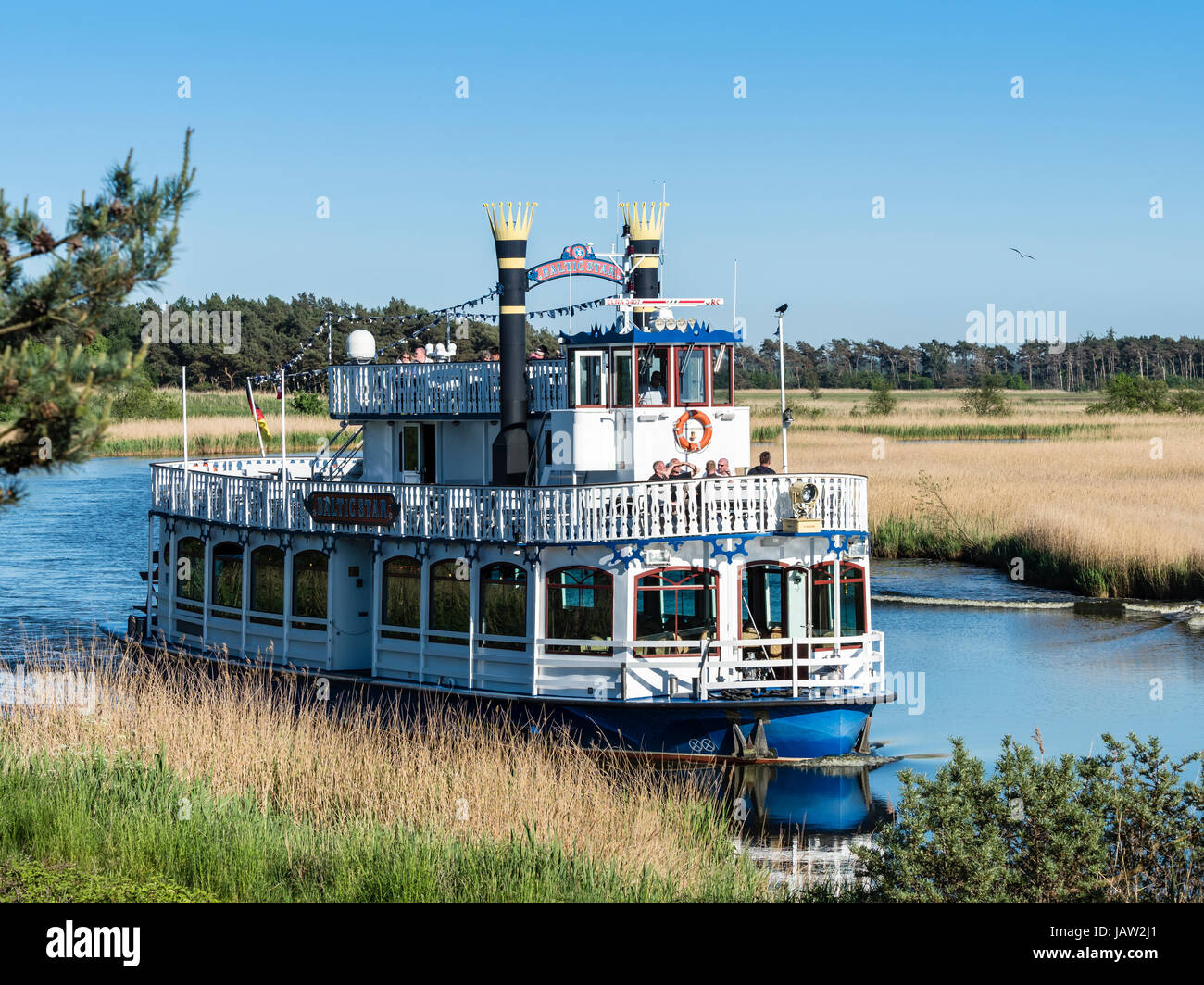 Sightseeing boat near Prerow harbor, sailing on Prerowstrom (or ...
