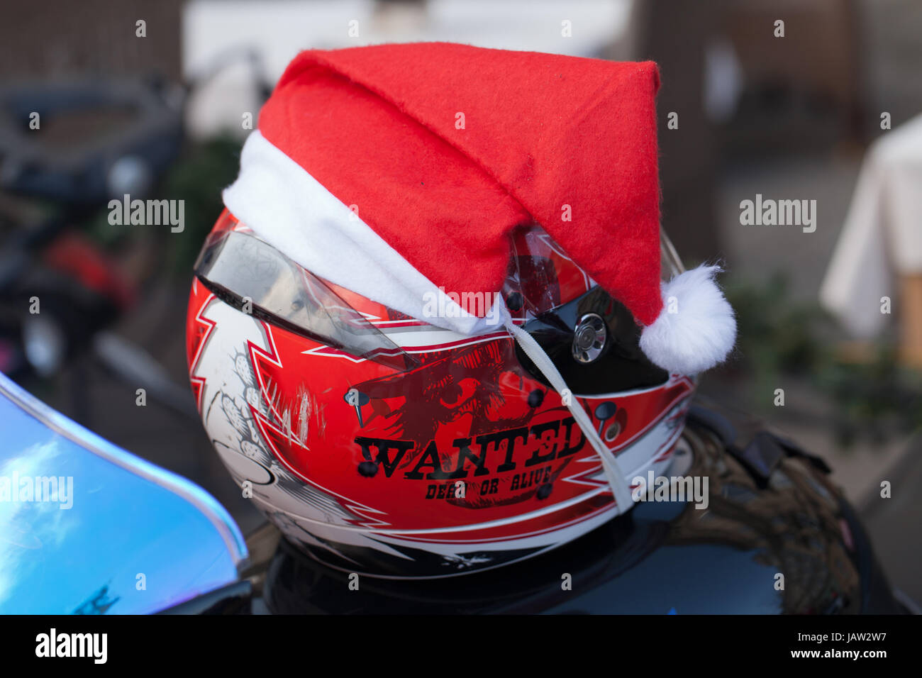 Decorated Christmas the crash helmet of Santa Claus Stock Photo - Alamy