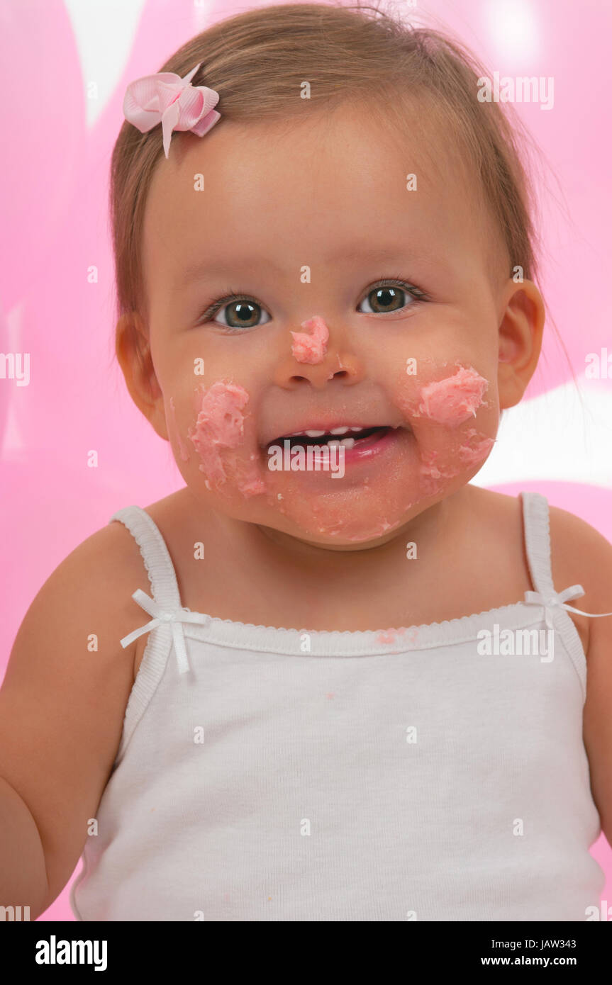 Messy child eating cupcake hi-res stock photography and images - Alamy