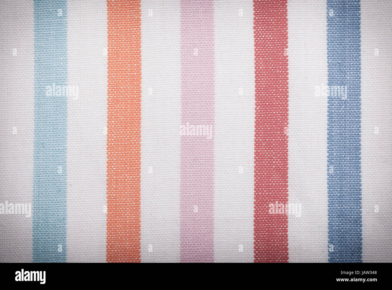 Closeup of colorful vertical striped fabric textile as background ...