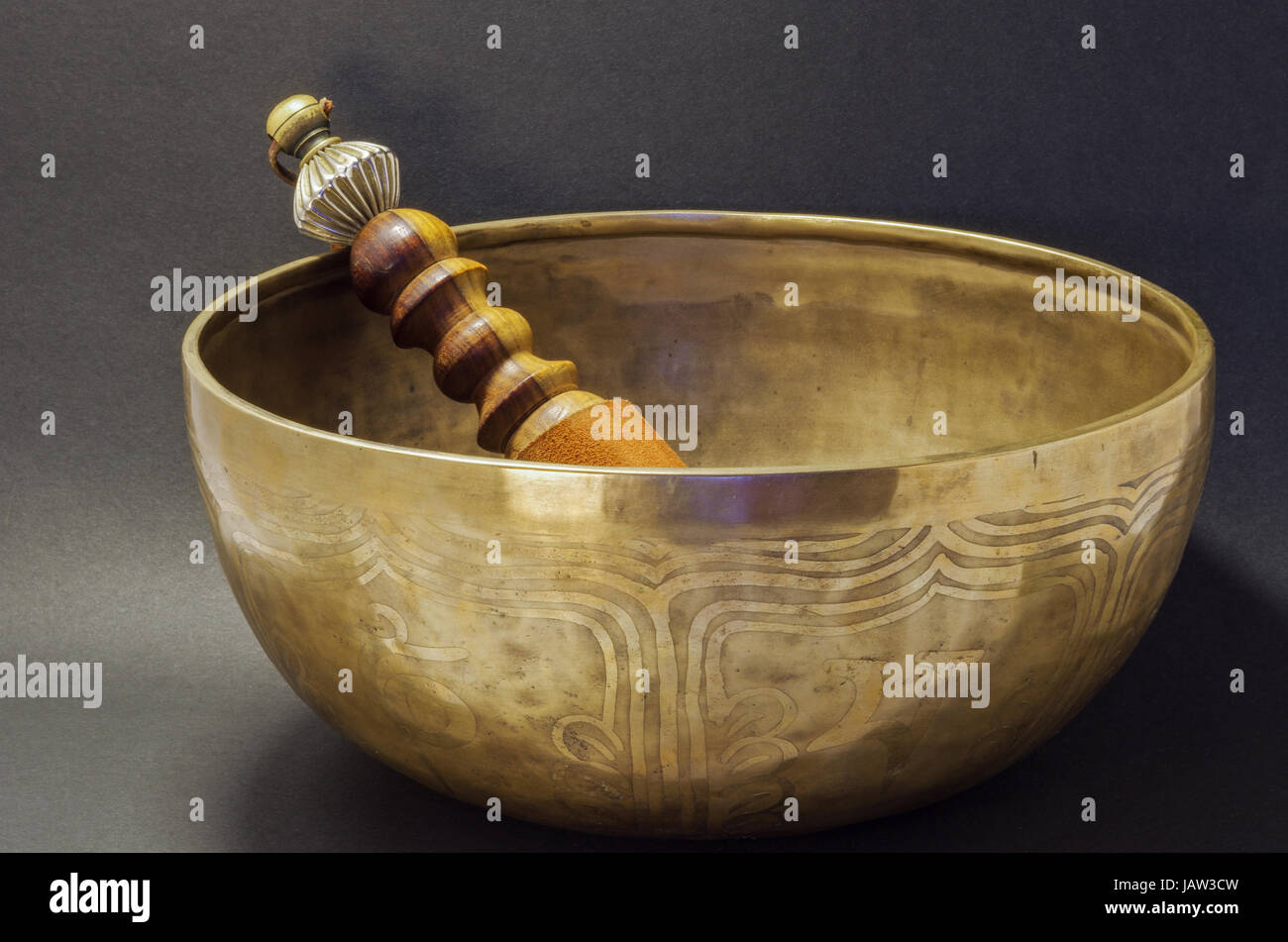Tibetan singing bowl during meditation hi-res stock photography and ...