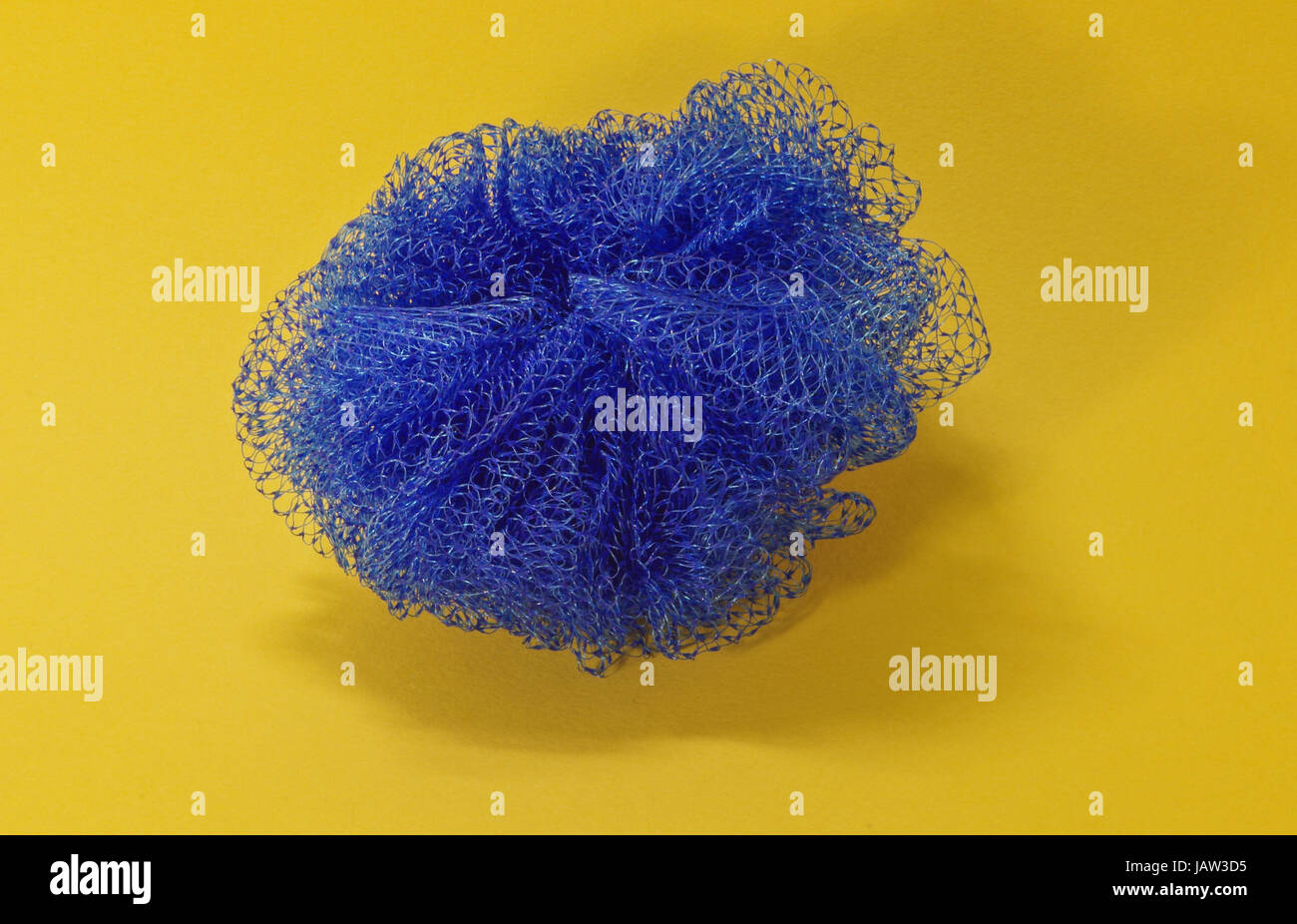 Blue bath sponge Stock Photo - Alamy