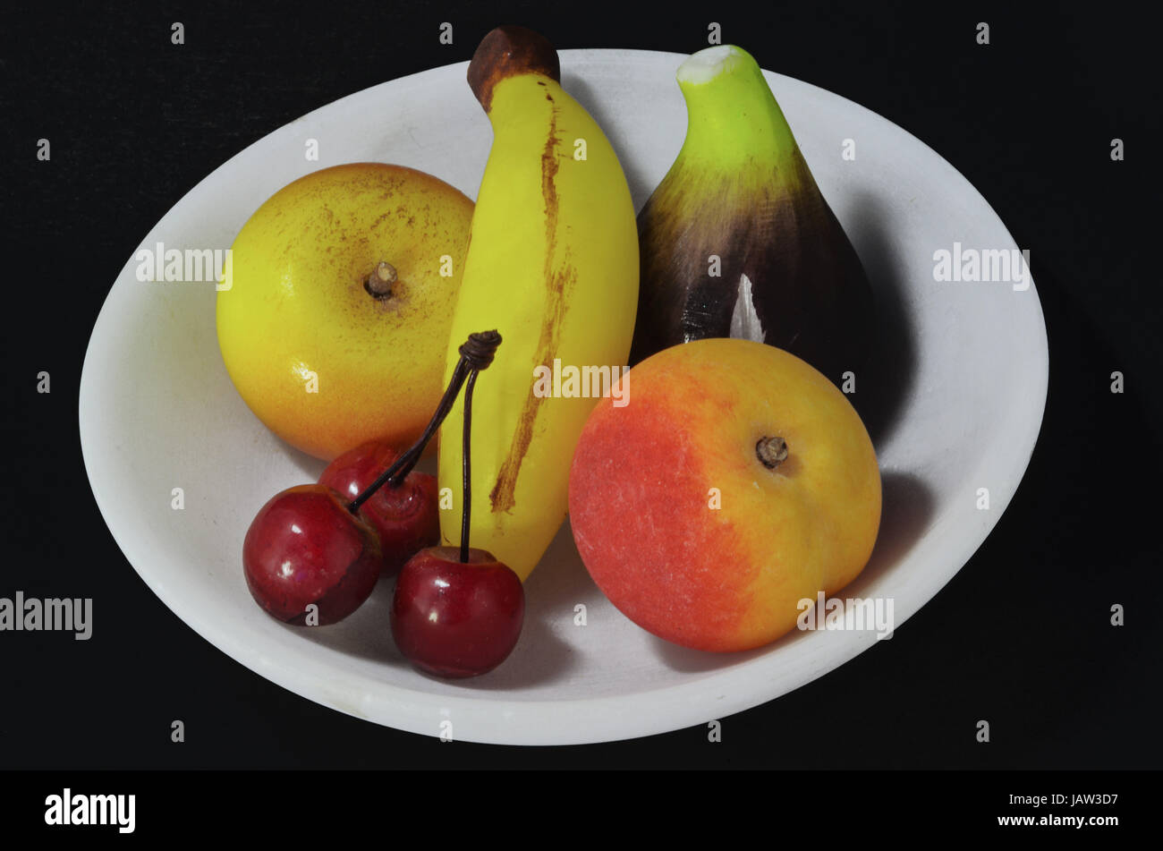 Alabaster fruits are hand-made in Volterra, Tuscany Stock Photo - Alamy