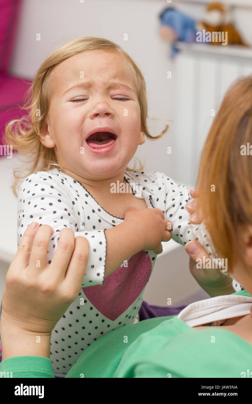 Portrait of sad unhappy crying little girl Stock Photo - Alamy
