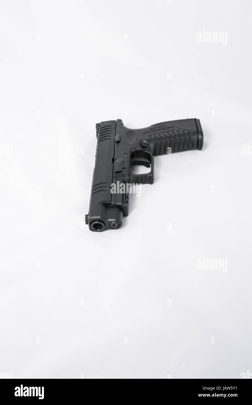 Black hand gun on white background with details Stock Photo - Alamy