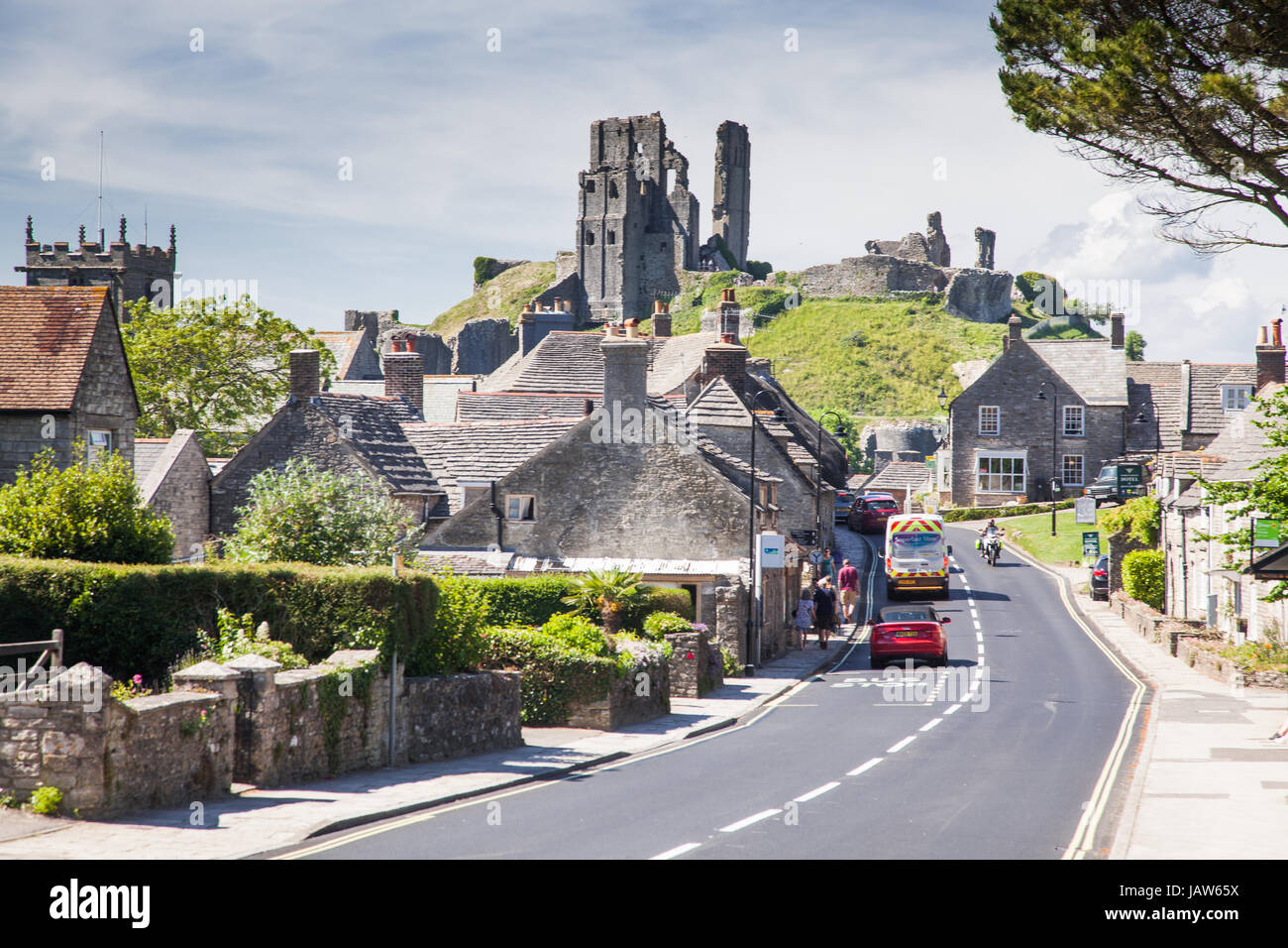 CORFE CASTLE, UK - 1st JUNE, 2017: Village of Corfe and ruins of Corfe ...