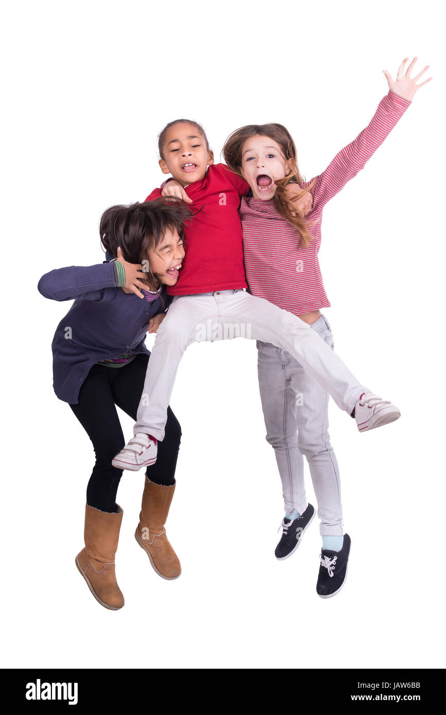 Group of young girls jumpng isolated in white Stock Photo - Alamy