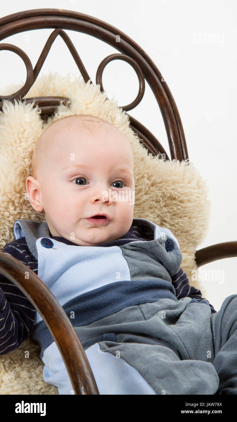 newborn child in rocking chair. studio shot Stock Photo - Alamy