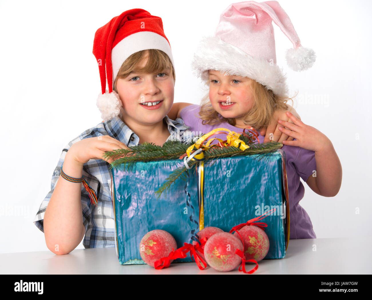 cheerful child with christmas present Stock Photo - Alamy