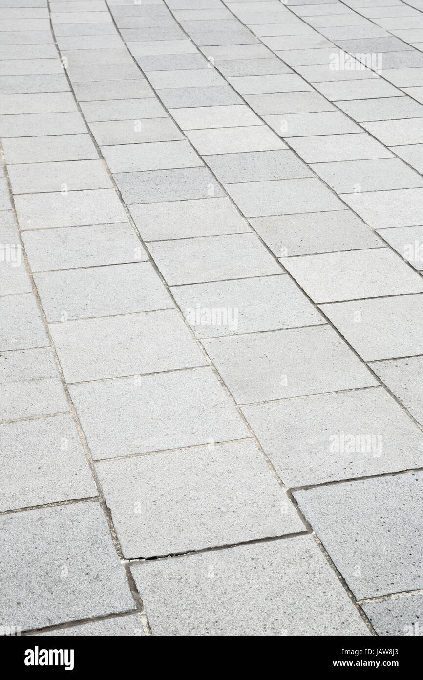 Perspective of concrete brick pavement road Stock Photo - Alamy