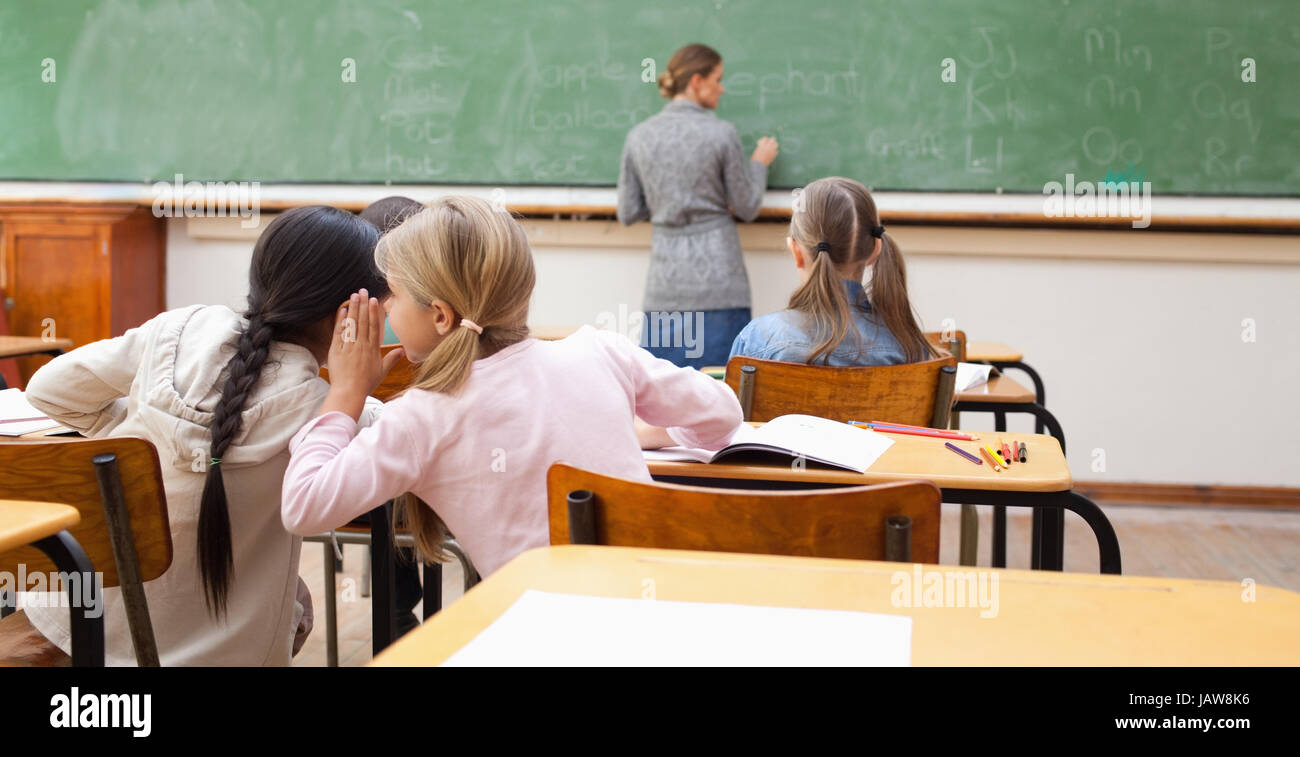 Schoolchildren whispering class hi-res stock photography and images - Alamy